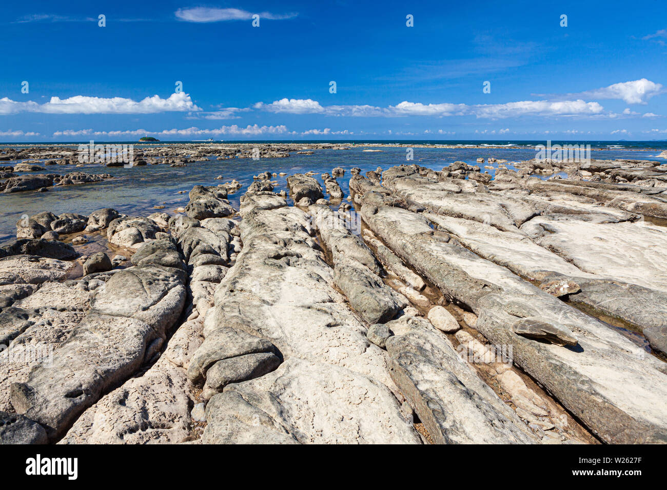 Rock formations at beach in tip of Borneo Stock Photo - Alamy