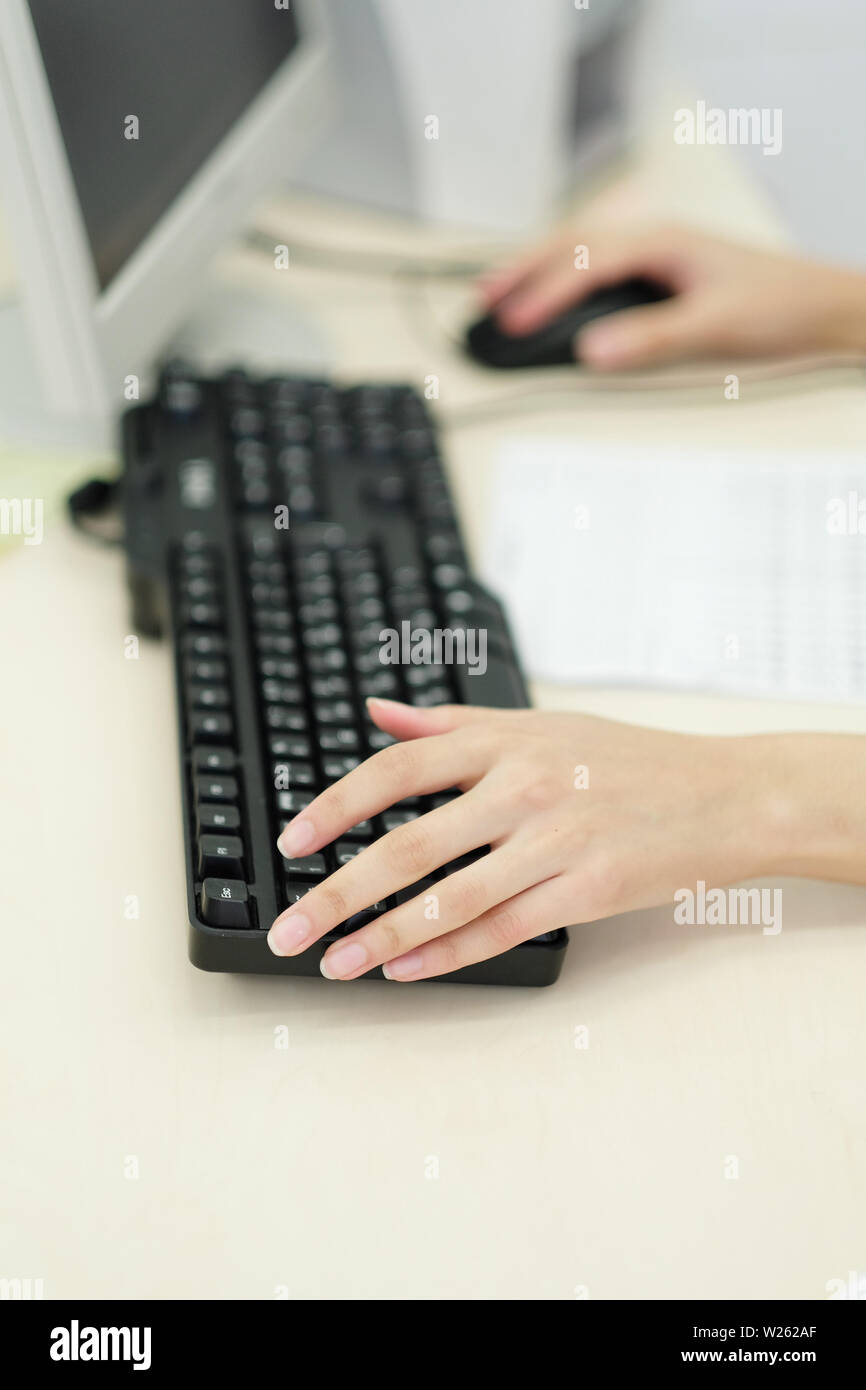Hand on computer keyboard Stock Photo - Alamy