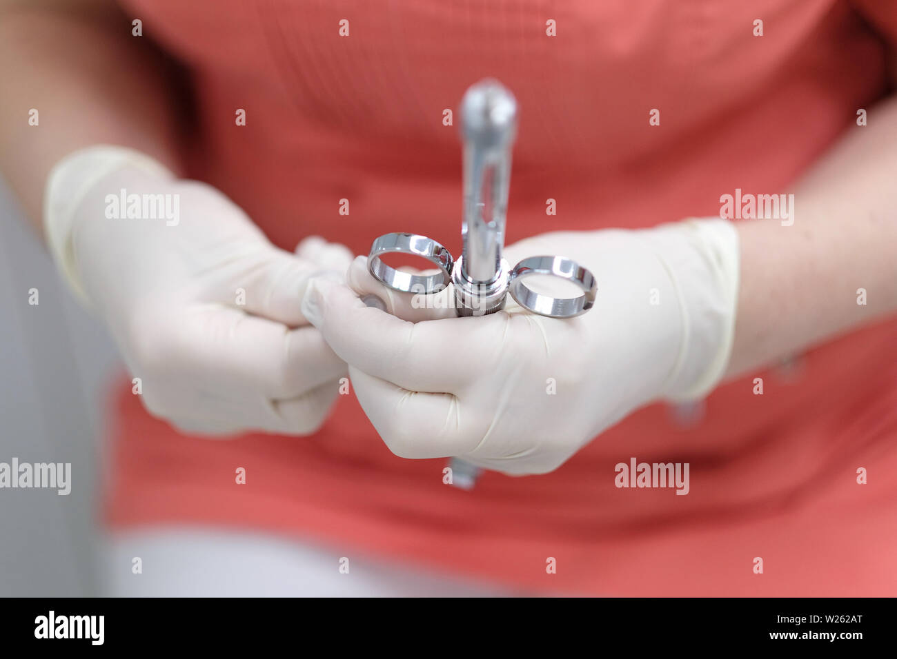 Dental tool in the hands of the doctor Stock Photo - Alamy