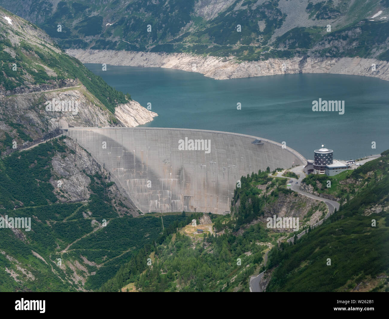Dam and Reservoir of a Hydroelectric Powerplant in Stunning Alpine ...