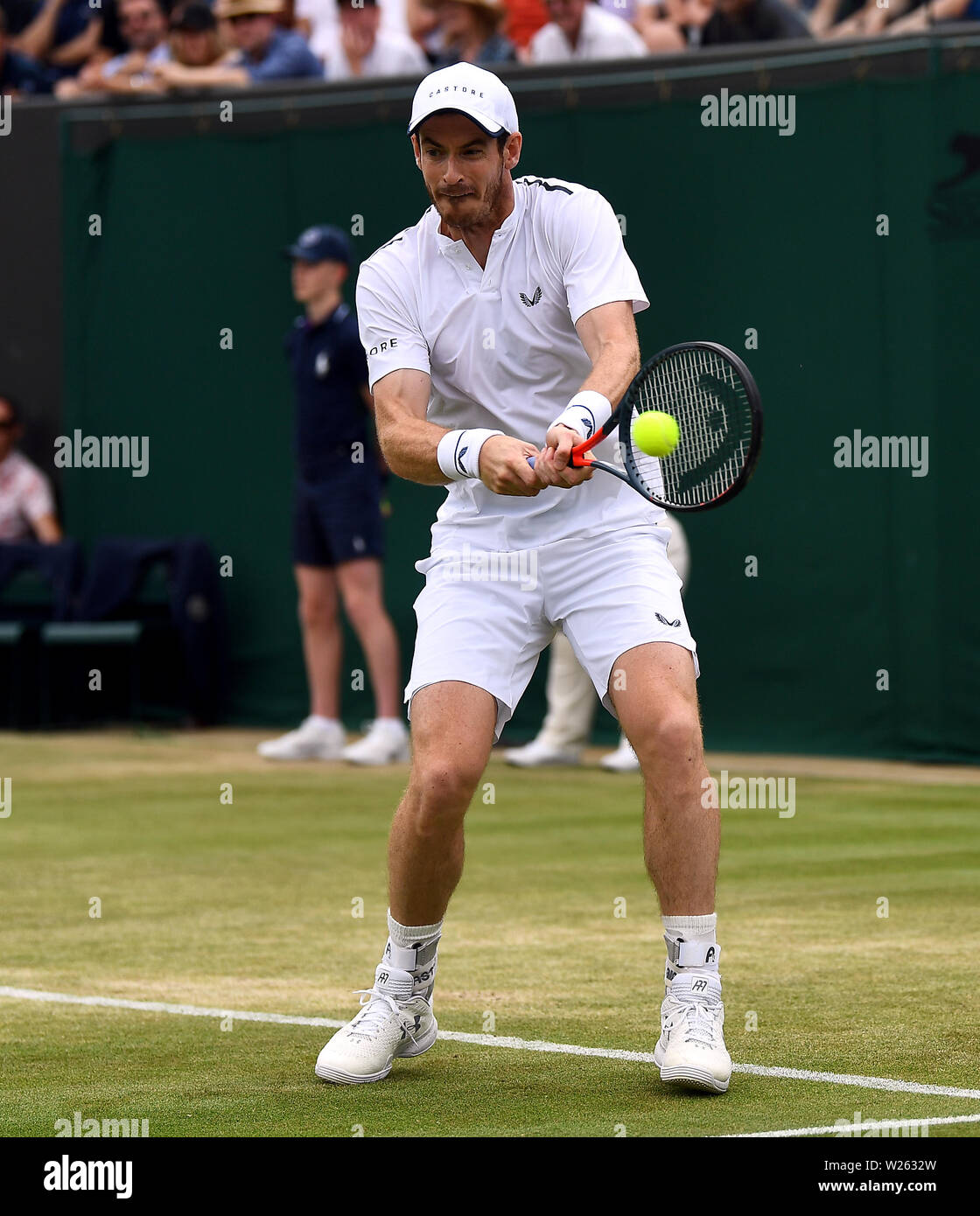 Andy Murray in action during his mens doubles match on day six of the ...
