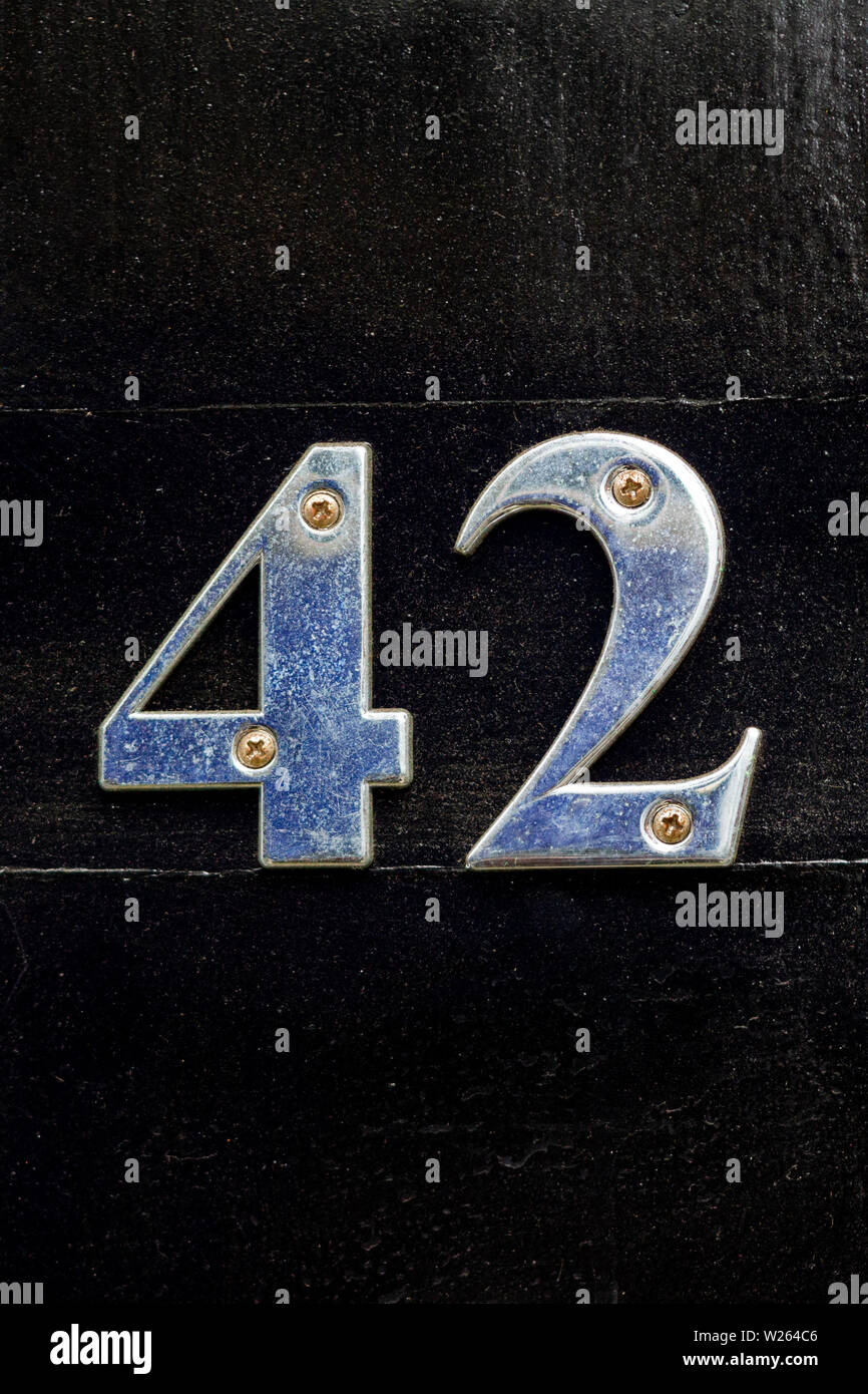 House number 42 with the forty-two in shiny silver metal digits on a ...