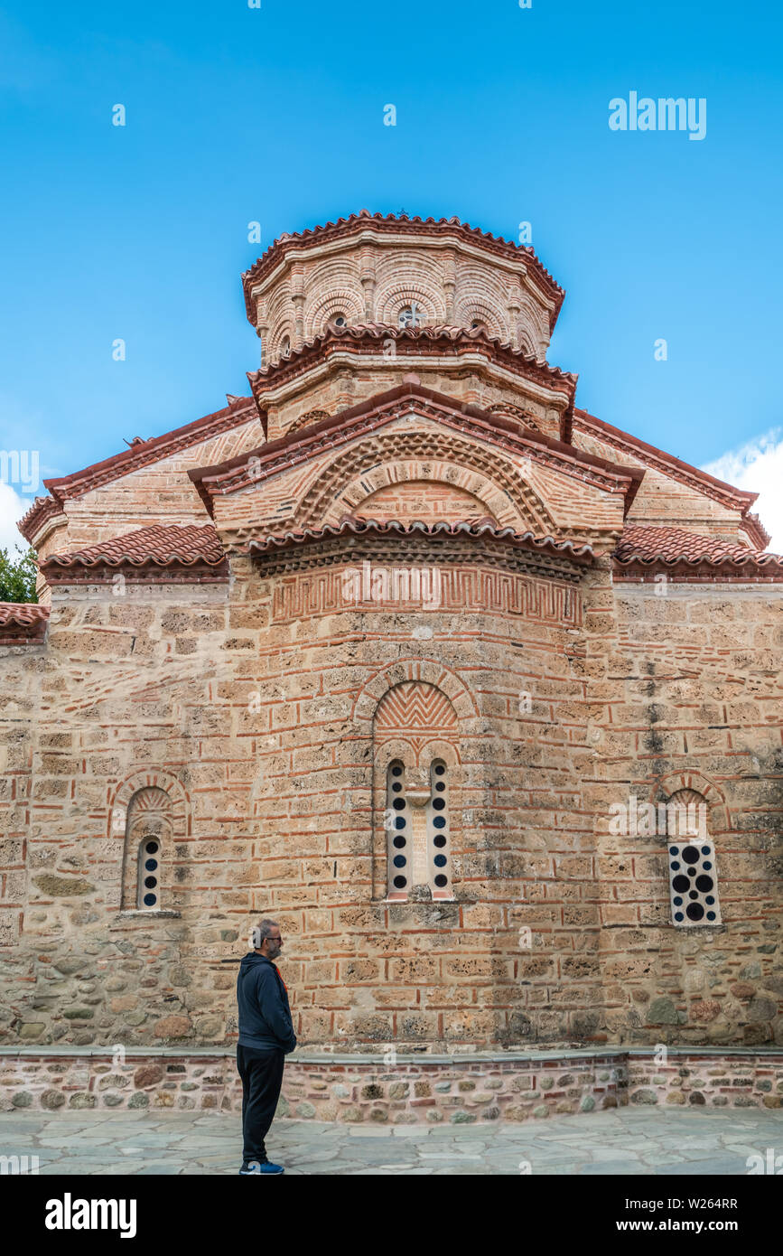Meteora, Greece - April 2019 : Male tourist in front of an ancient ...