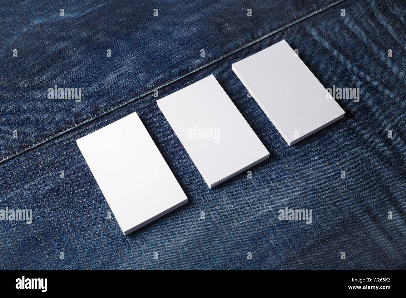 Mockup of blank business cards on denim background. Branding mock up ...
