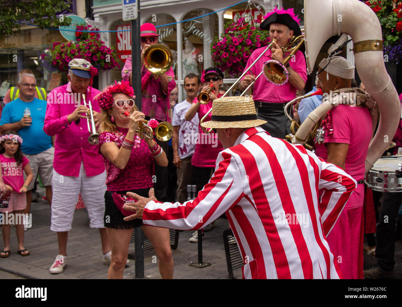 Jazz band street performance wearing pink cloths playing in Clonakilty ...