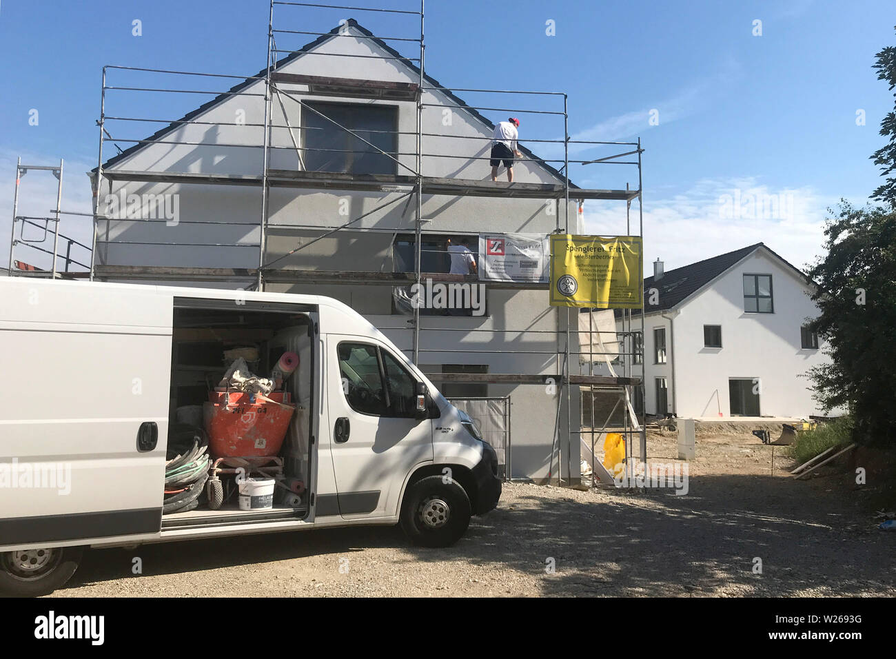 Grafing, Deutschland. 05th July, 2019. Construction worker on a ...