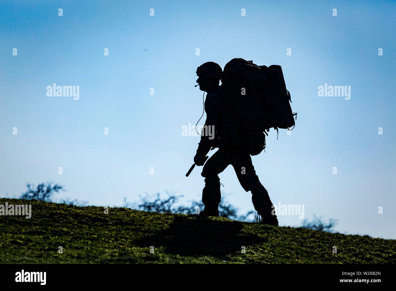 SENNYBRIDGE, UNITED KINGDOM. 27th Mar 2019. A Royal Marine heads into ...