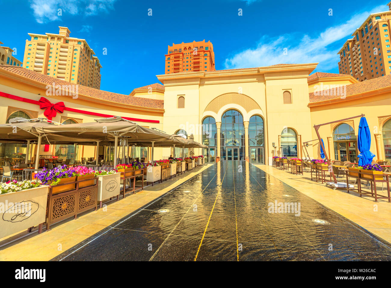 Doha, Qatar - February 18, 2019: modern fountain in front of popular ...