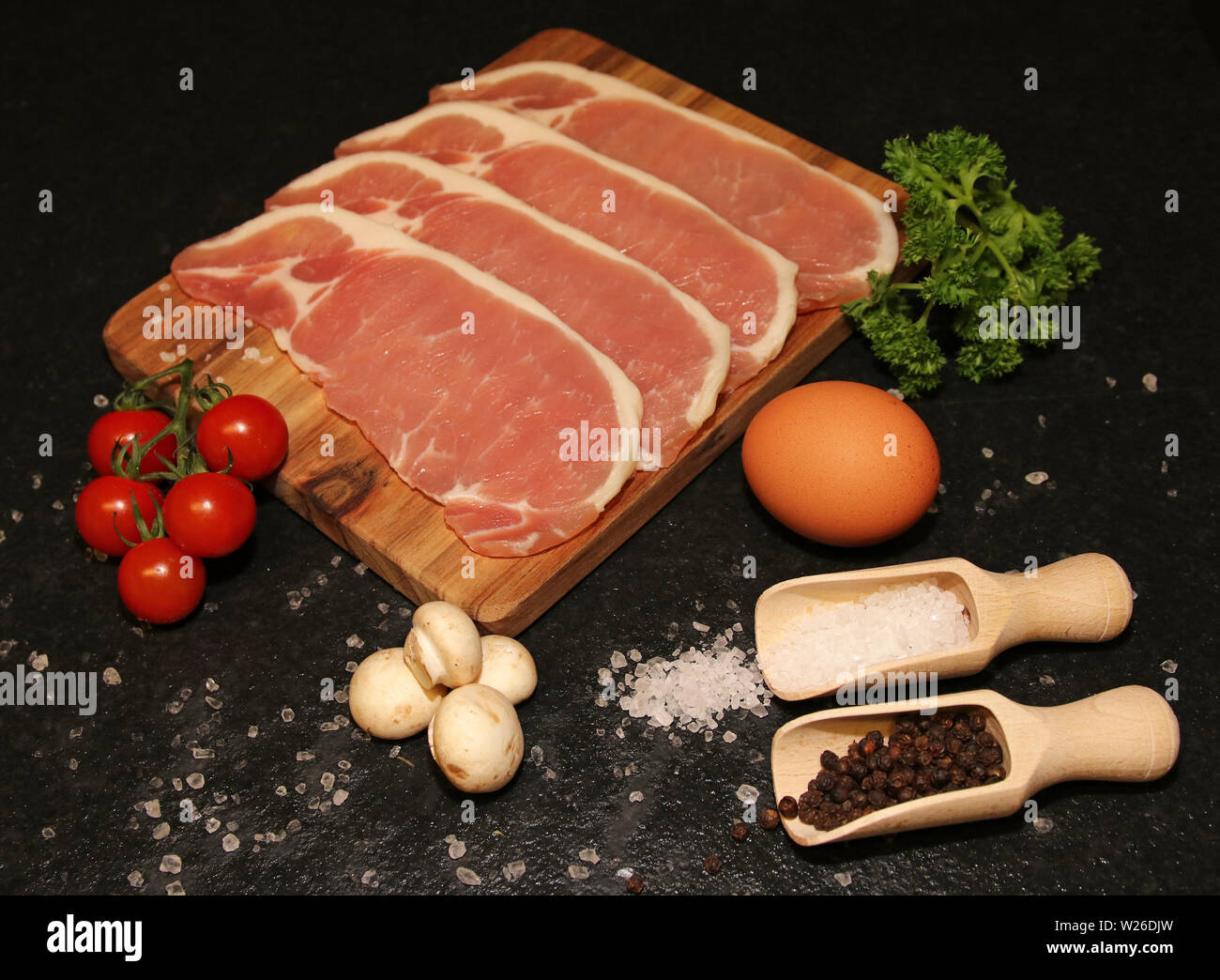 Bacon ready to cook breakfast Stock Photo - Alamy