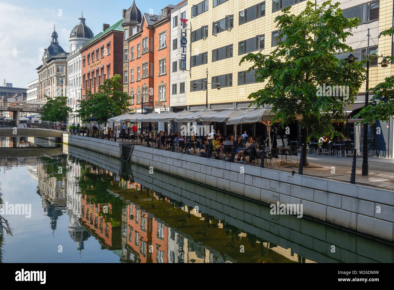 Aarhus, Denmark - 19 June 2019: people drinking on a street bar of ...