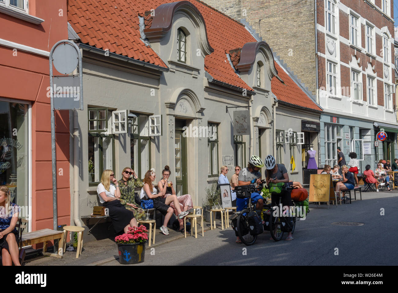Aarhus, Denmark - 19 June 2019: people drinking on a street bar of ...