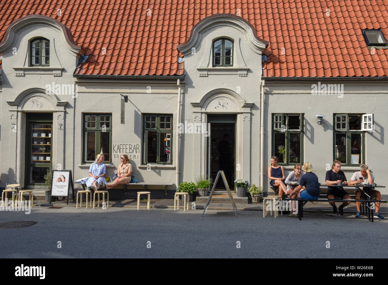 Aarhus, Denmark - 19 June 2019: people drinking on a street bar of ...