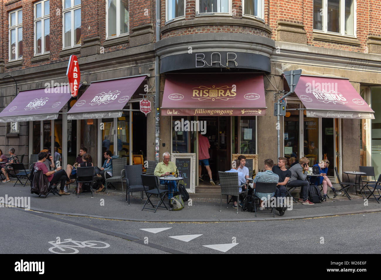 Aarhus, Denmark - 19 June 2019: people drinking on a street bar of ...