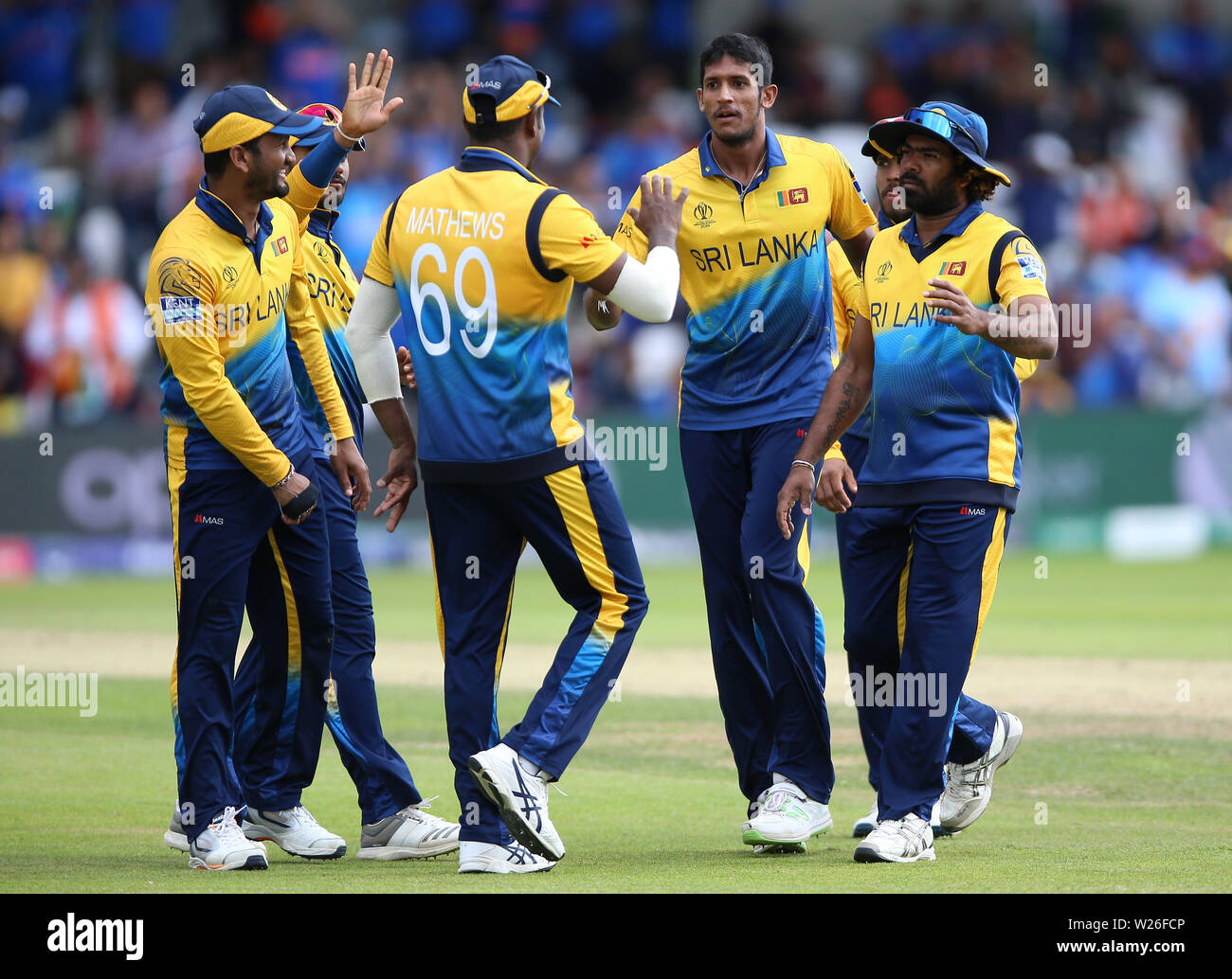Sri Lanka's Kasun Rajitha celebrates the wicket of India's Rohit Sharma ...