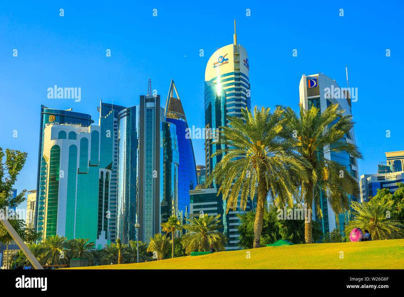 Doha, Qatar - February 20, 2019: Palm trees in West Bay Sheraton Park ...