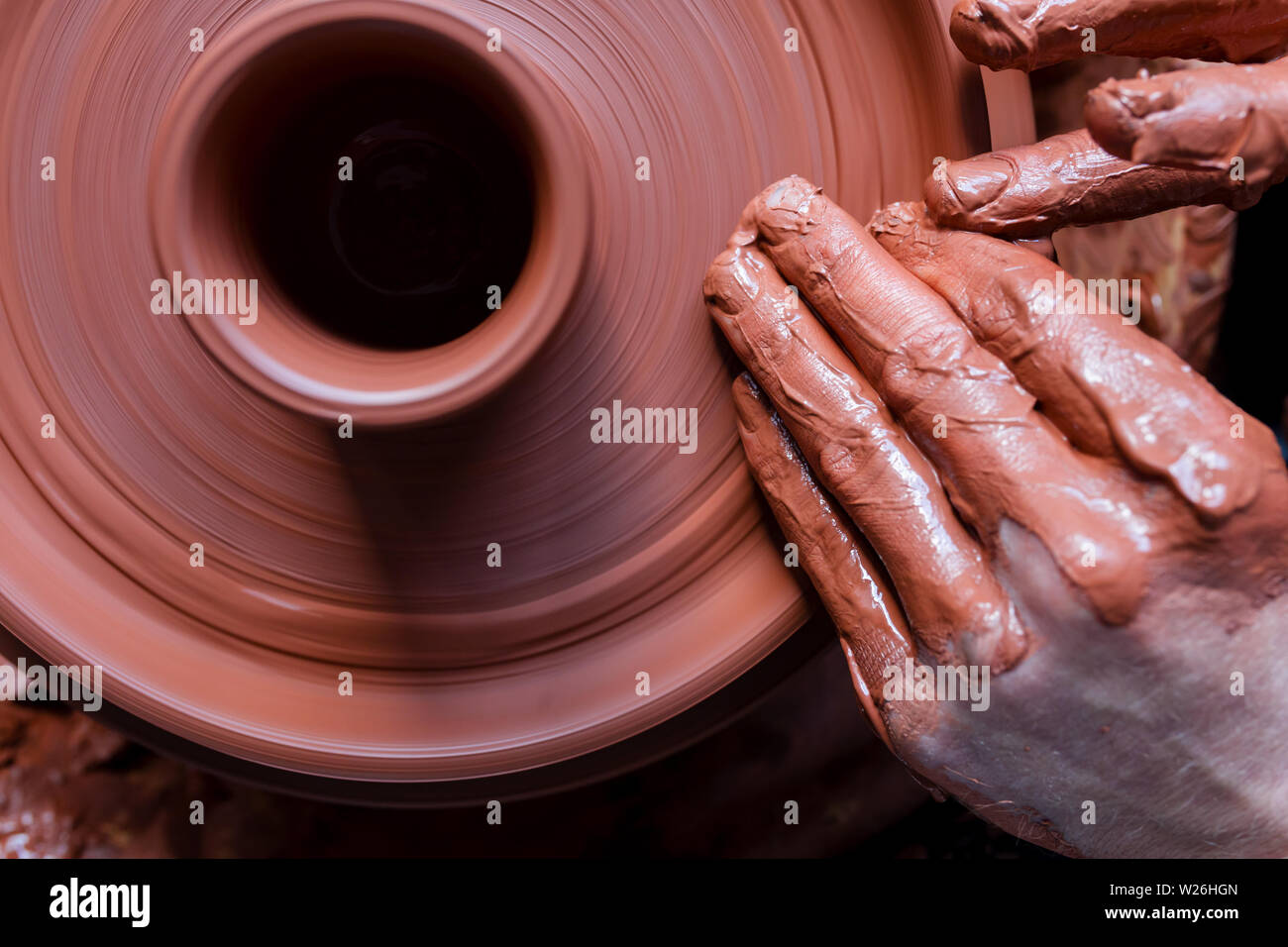 Professional potter making bowl in pottery workshop, studio Stock Photo ...