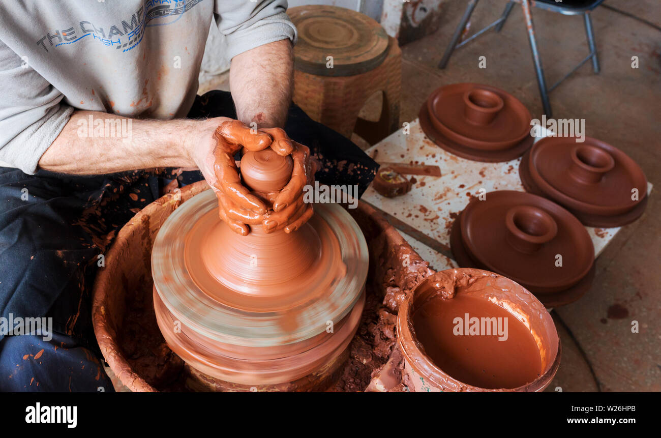 Professional potter making bowl in pottery workshop, studio Stock Photo ...