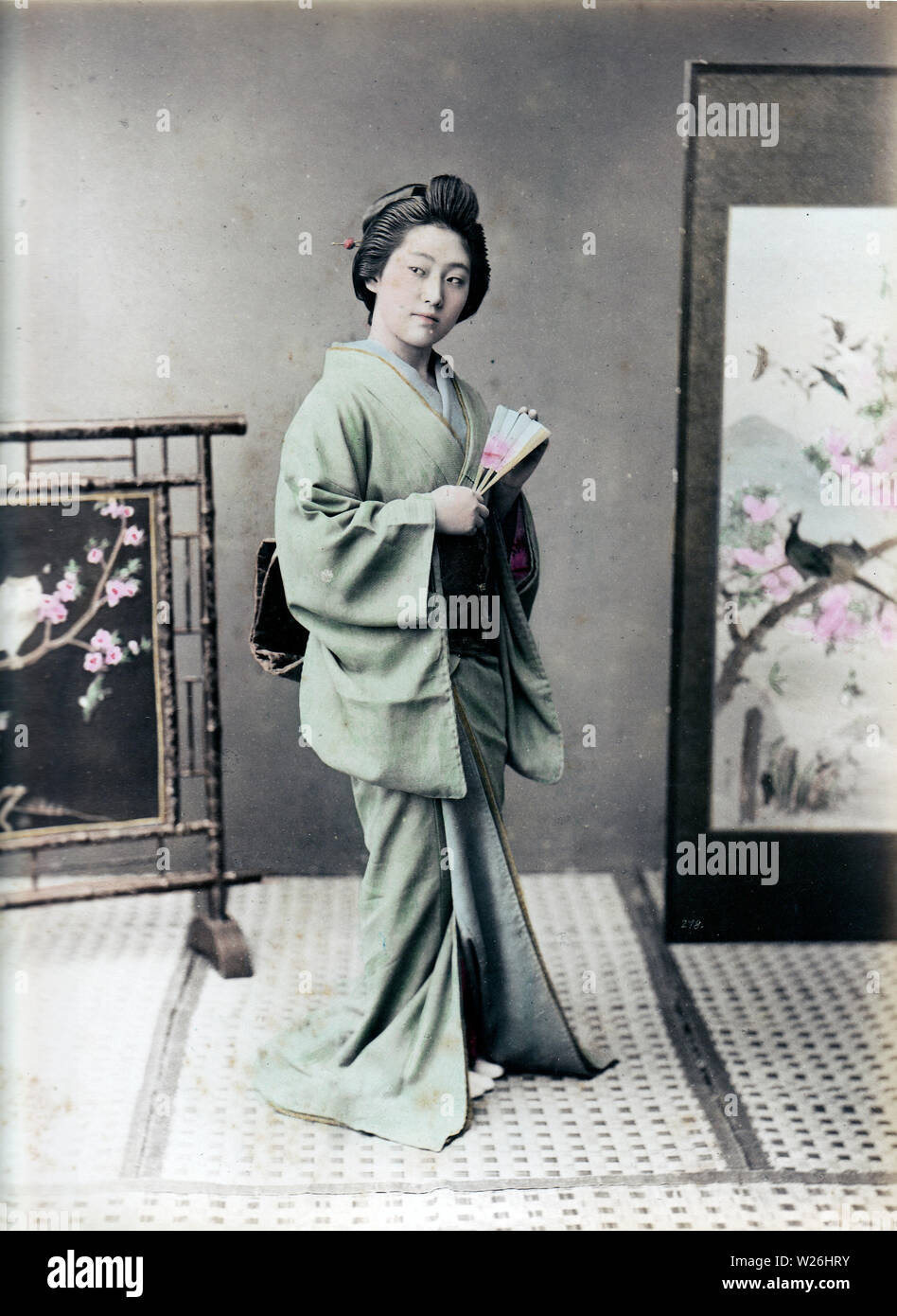 Japanese geisha poses in traditional hi-res stock photography and ...