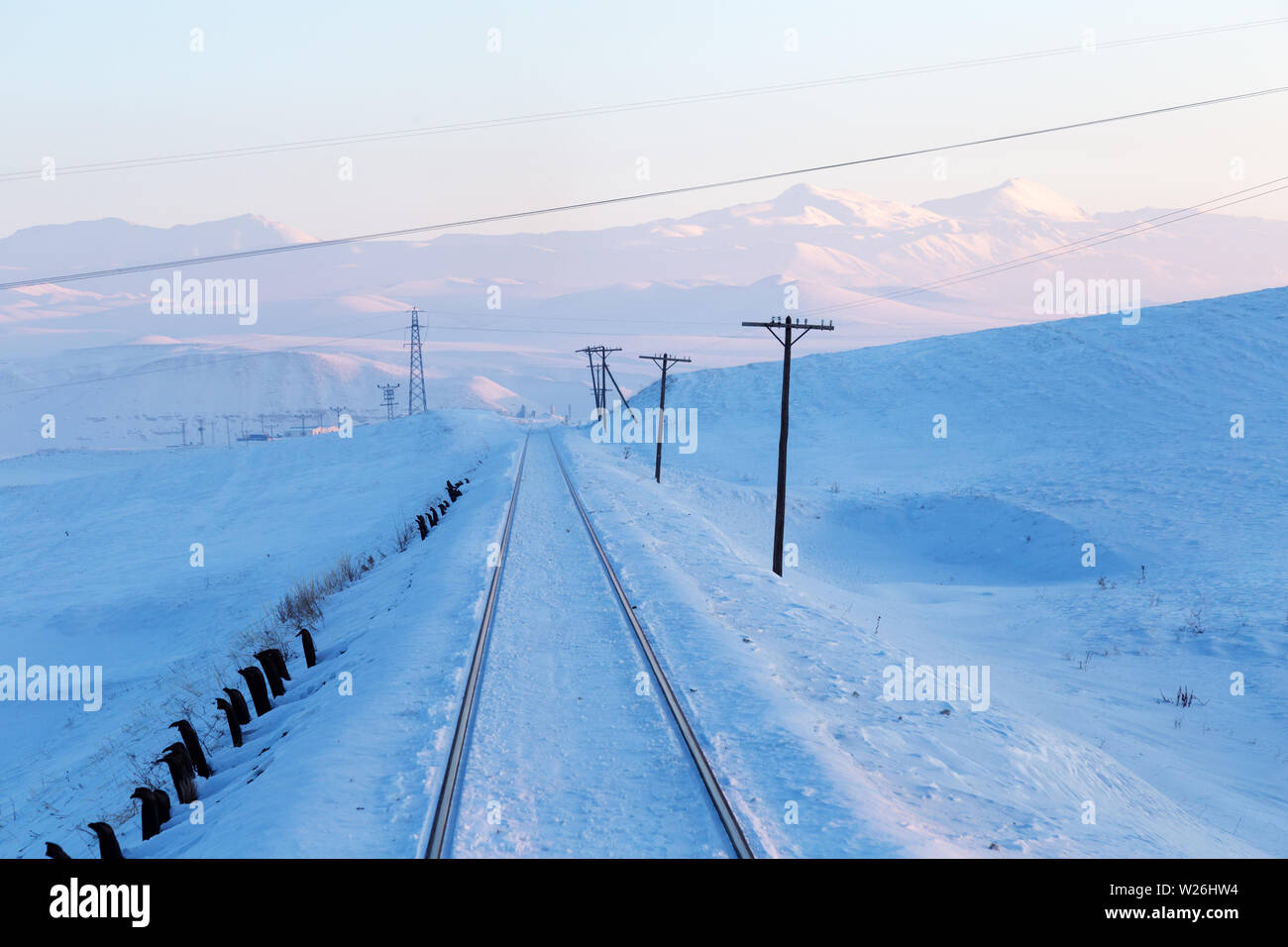 Snowy railway, background Stock Photo - Alamy