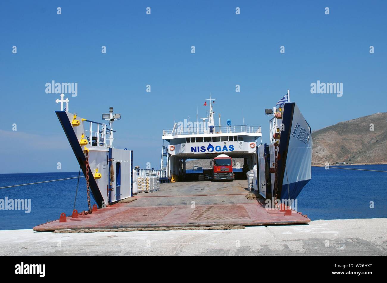 Cargo ship Agios Antonios moored at Livadia harbour on the Greek island ...