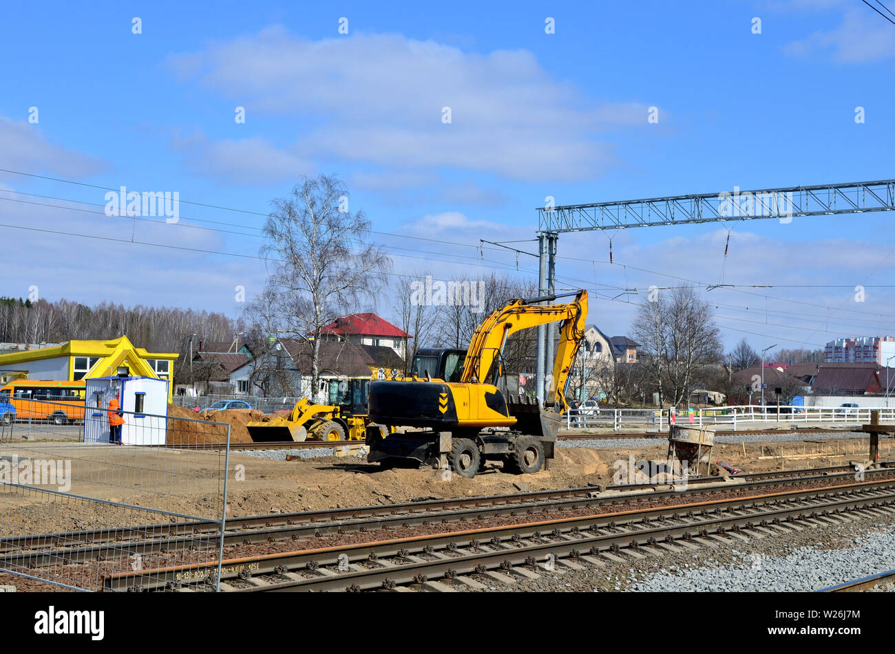 excavator on railway construction Stock Photo - Alamy