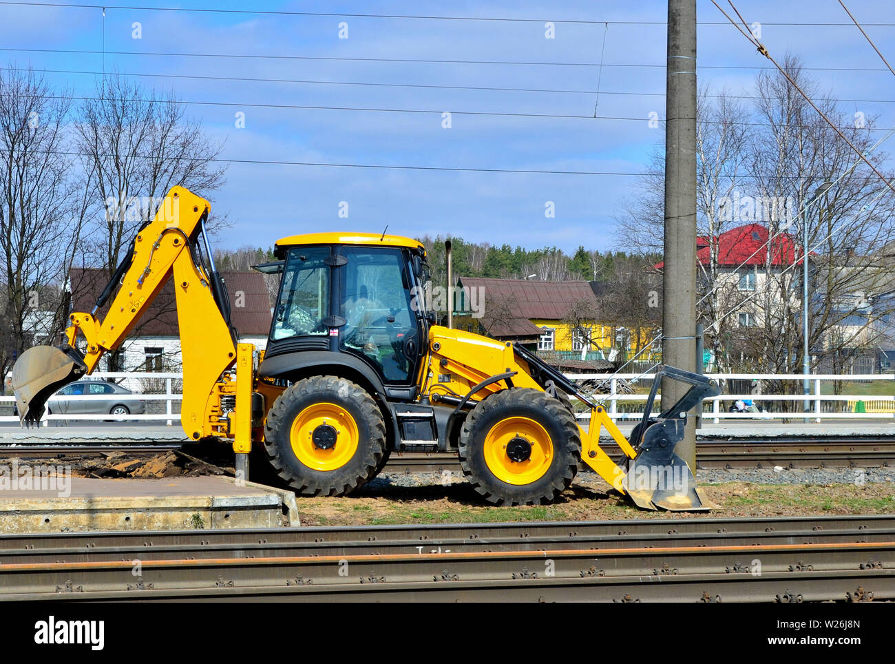 Yellow bulldozer carries out excavation work during the construction ...