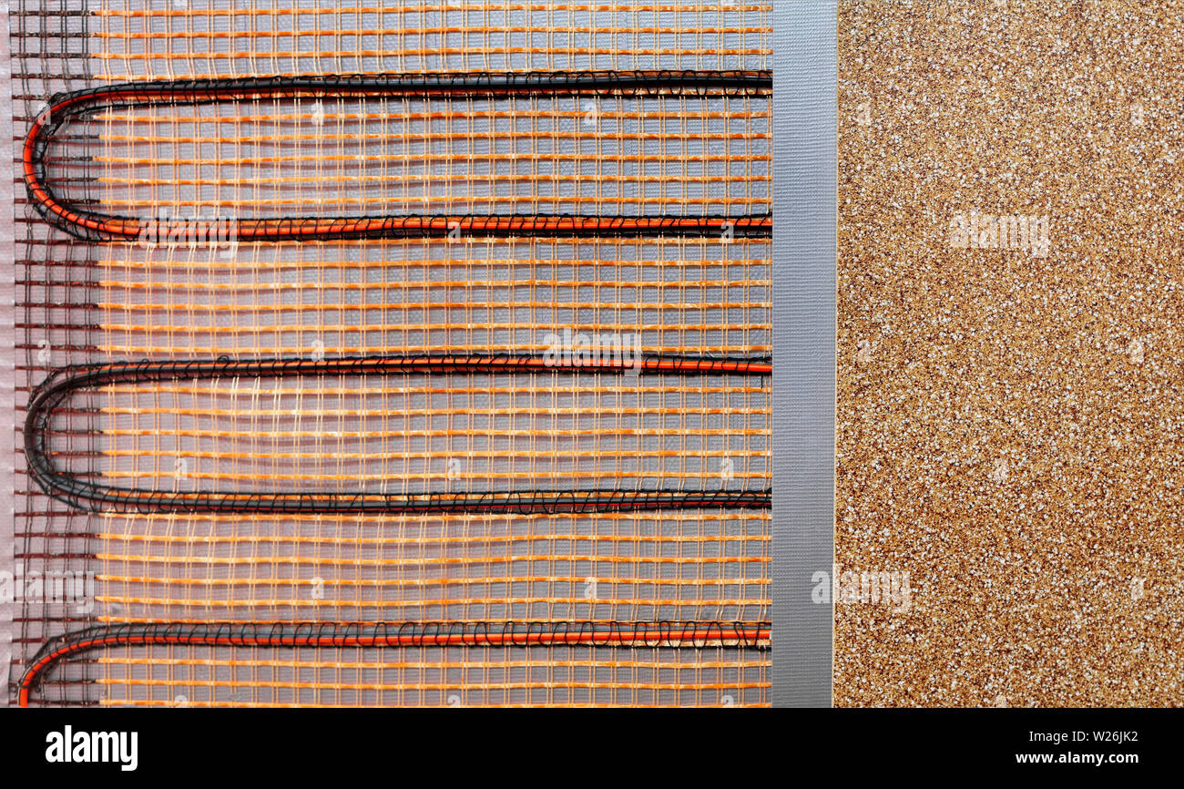 Installation of modern heating elements on the wall. The concept of ...