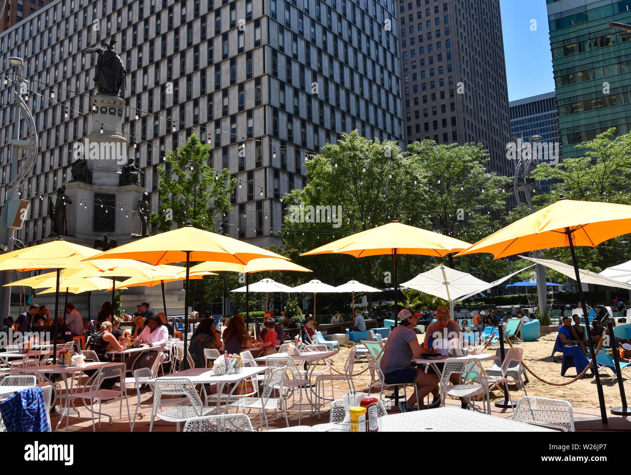 DETROIT, MI / USA - JUNE 30, 2019: Visitors relax at Campus Martius ...