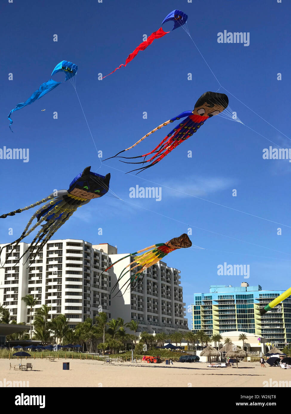 Kites in the likeness of superheroes Batman, Robin and Superman soar ...