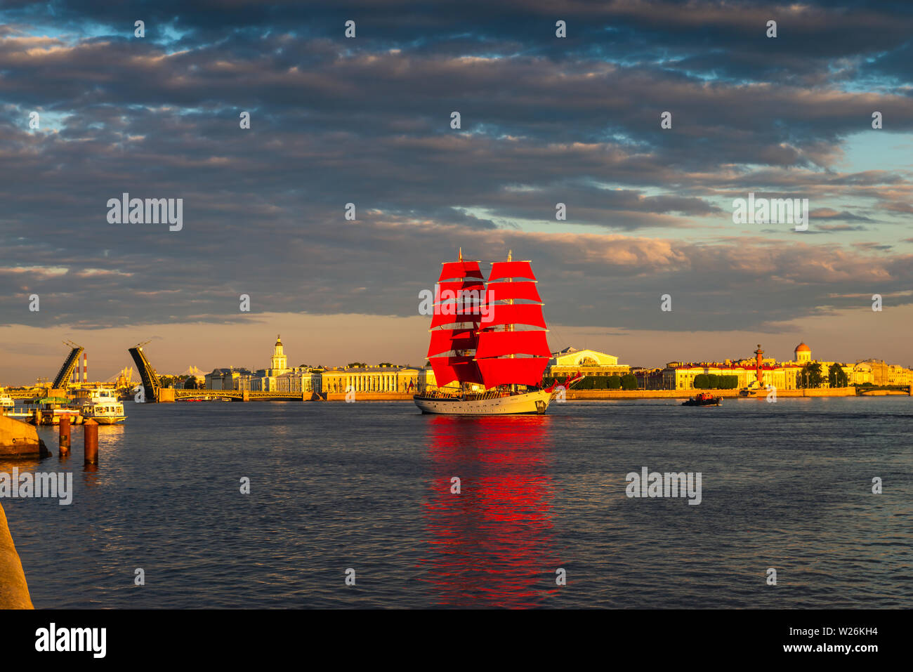 Ship with red sails sails on the Neva. Preparation for the holiday of ...