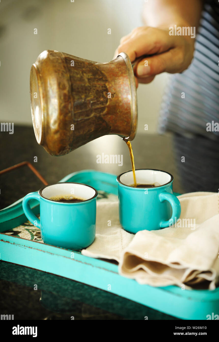 Pouring coffee in cups hi-res stock photography and images - Alamy