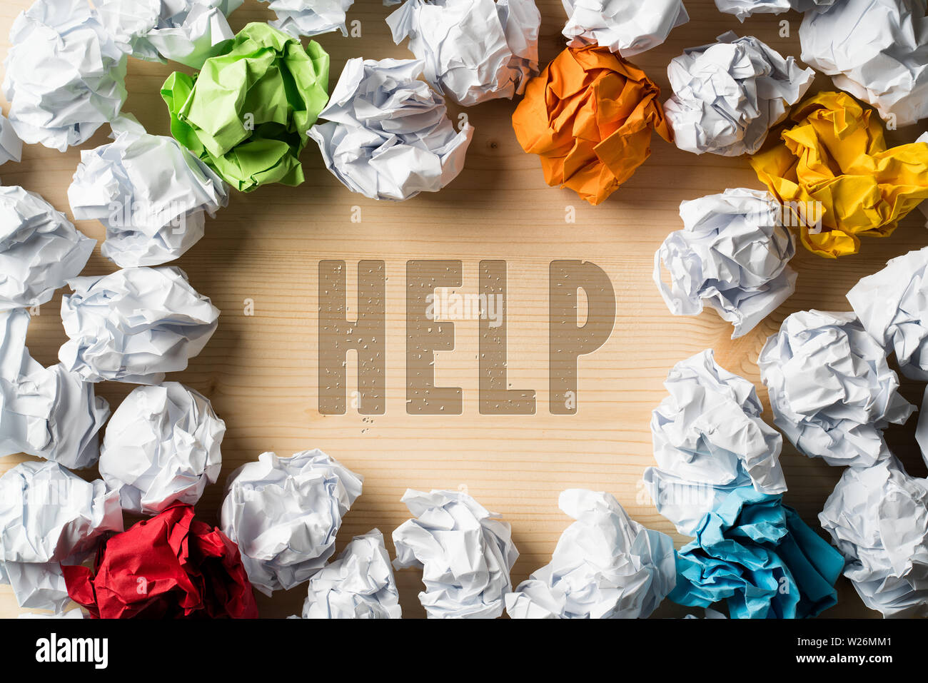 crumpled paper symbolizing different solutions and the word help Stock ...