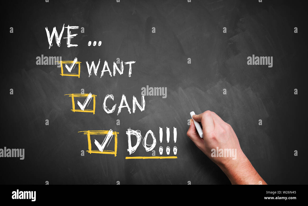 hand is writing 'we want, we can, we do' Stock Photo - Alamy
