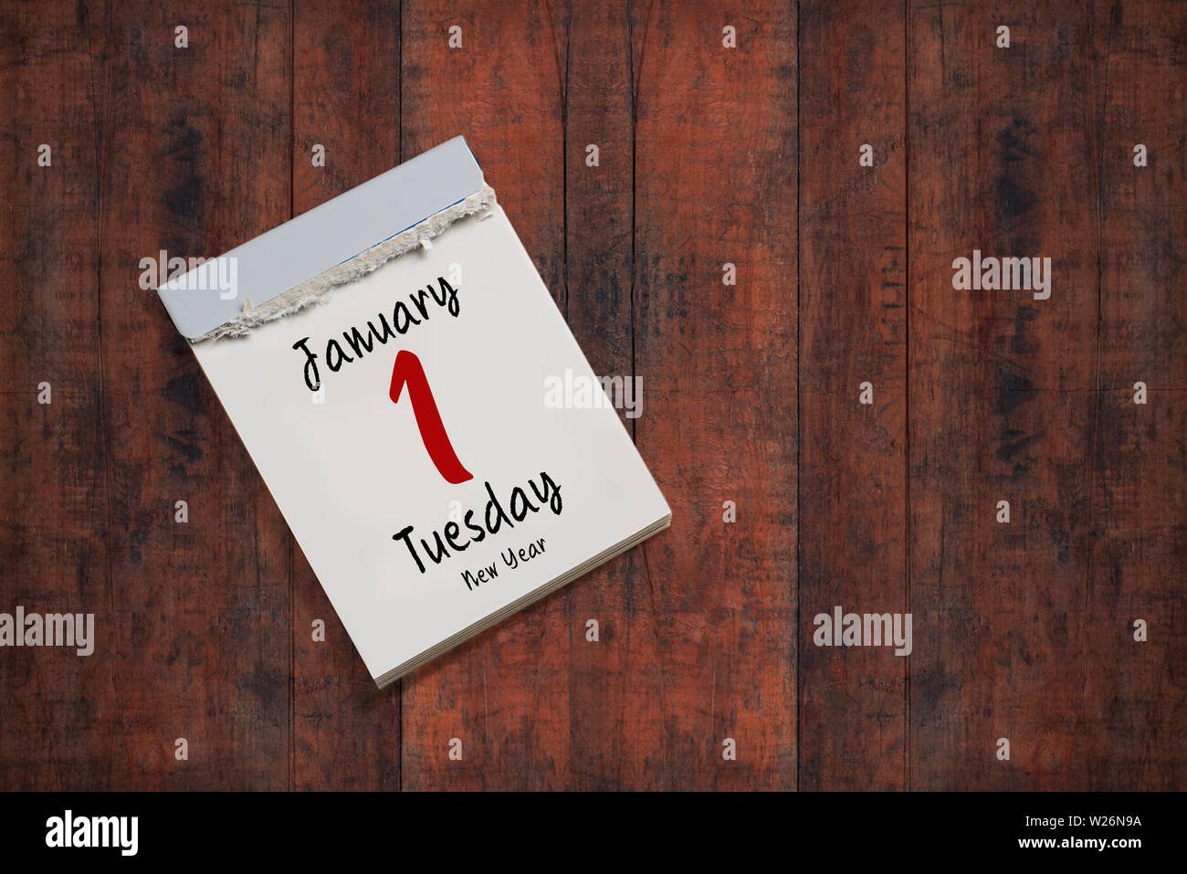 tear-off calendar with 1st of january 2019 on wooden background Stock ...