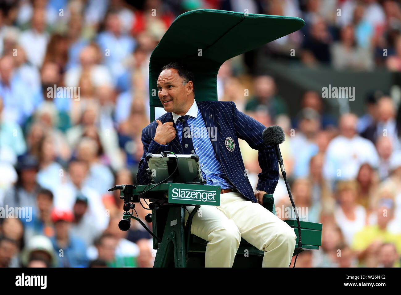 The match umpire on centre court on day six of the Wimbledon ...