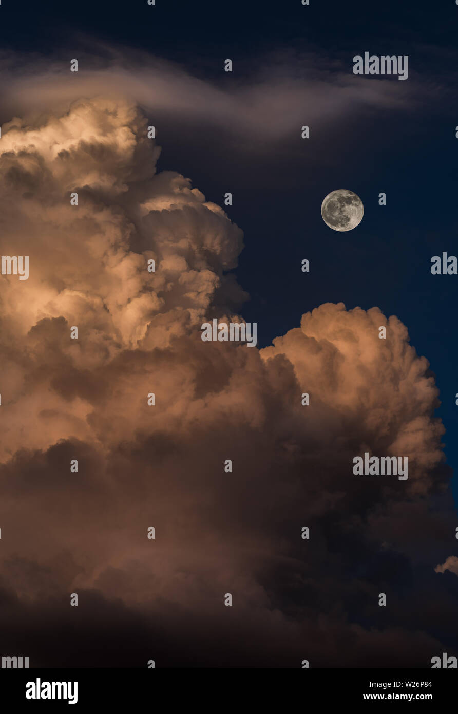 Background of storm clouds with full moon Stock Photo - Alamy