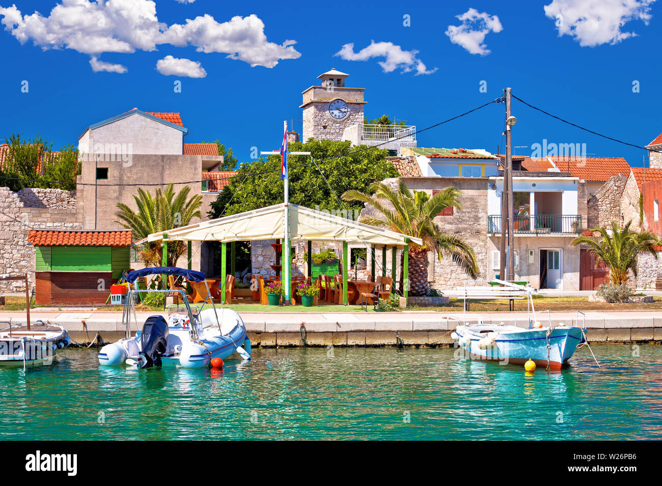 Colorful waterfront of Krapanj island, sea sponge harvesting village ...