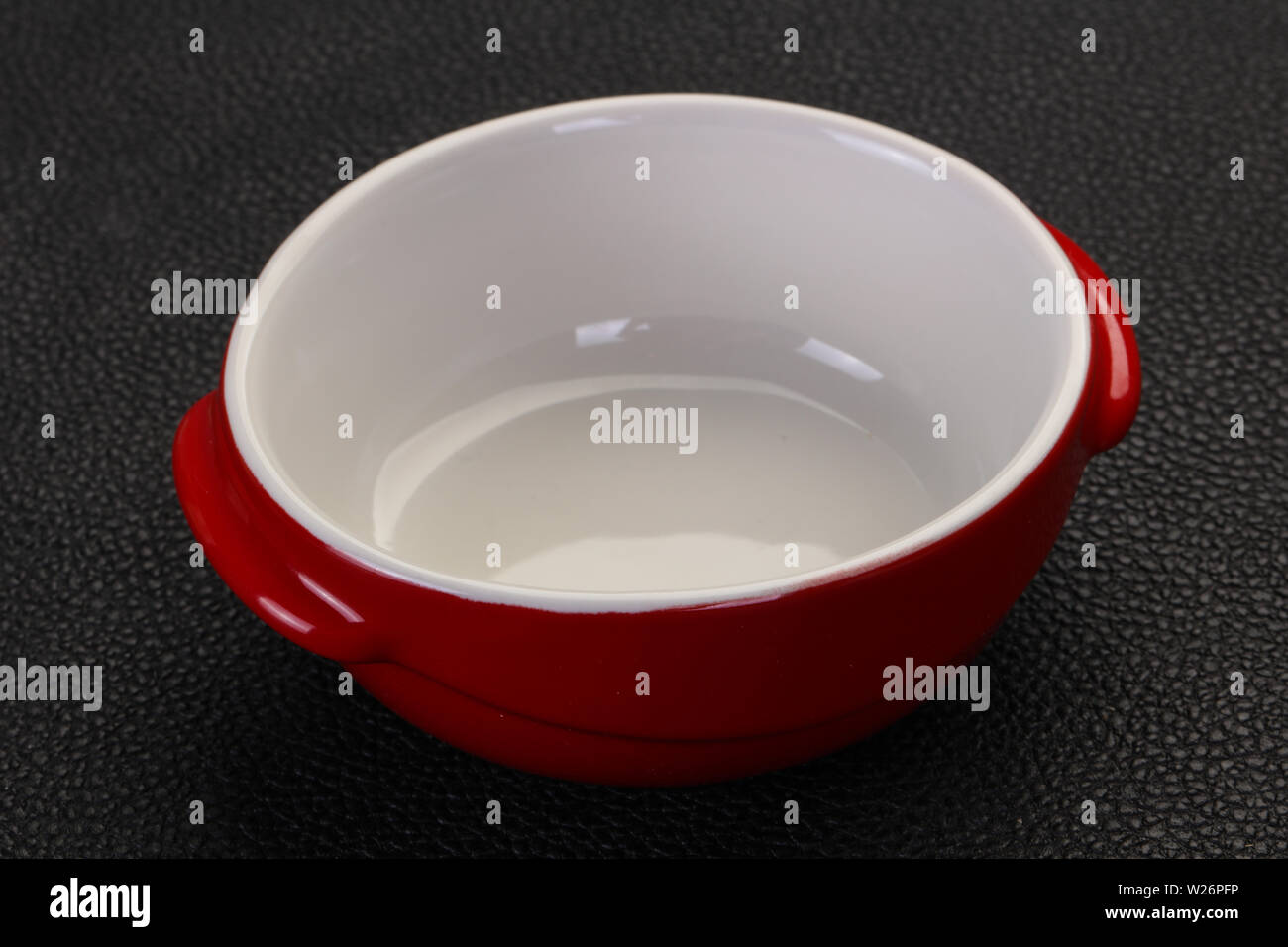 Empty ceramic bowl over black background Stock Photo - Alamy