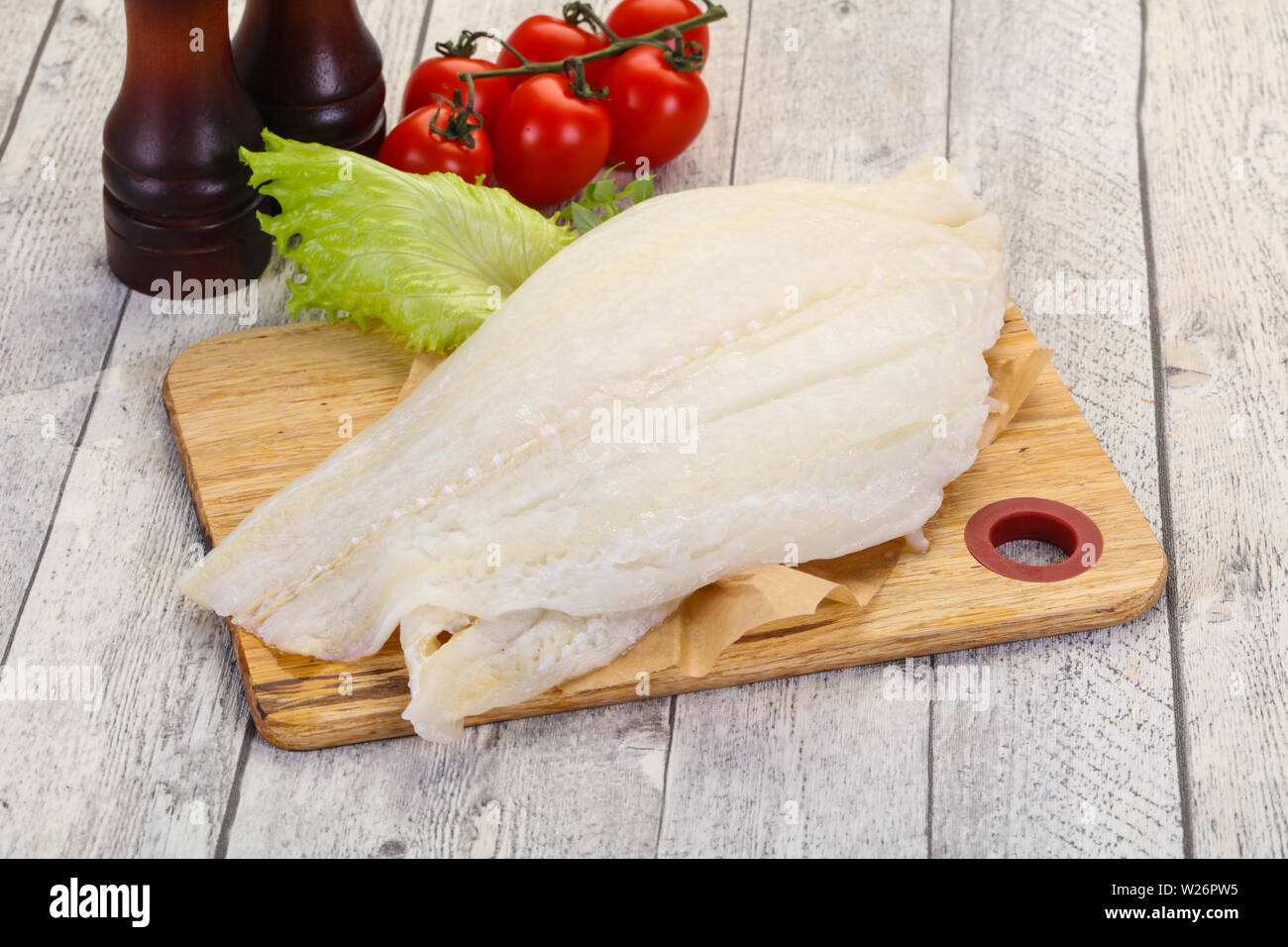 Raw halibut fillet ready for cooking Stock Photo - Alamy