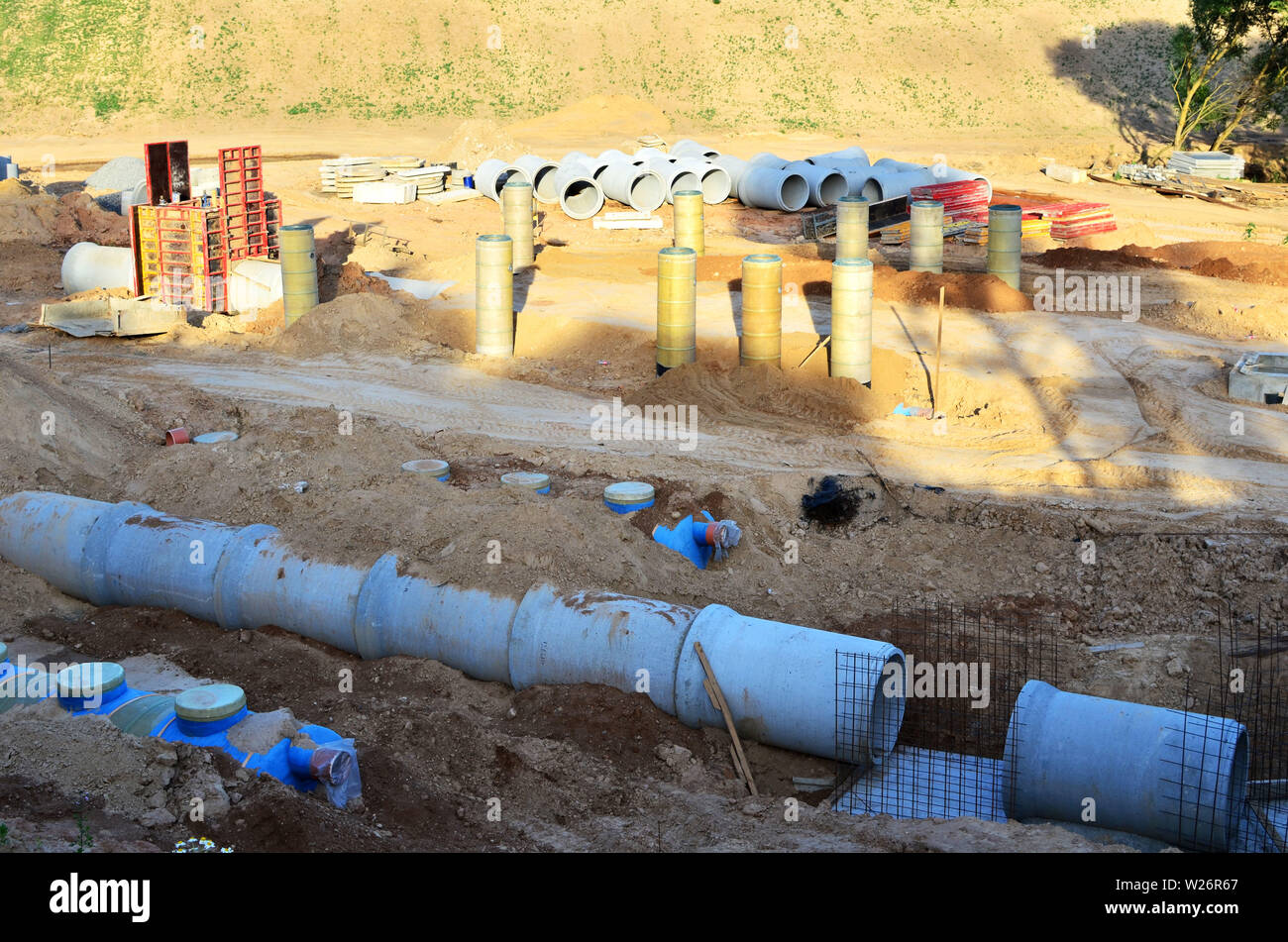 Laying or replacement of underground storm sewer pipes. Installation of ...