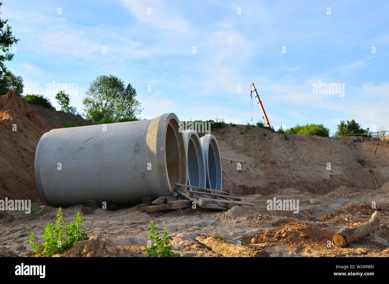 Laying or replacement of underground storm sewer pipes. Installation of ...