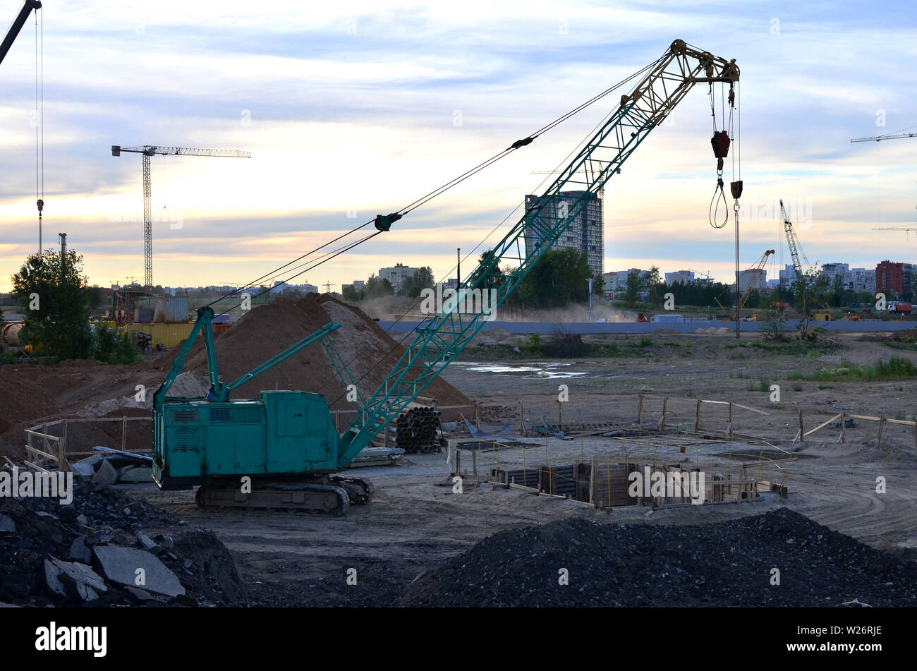 Crawler crane on the construction site for loading and unloading and ...