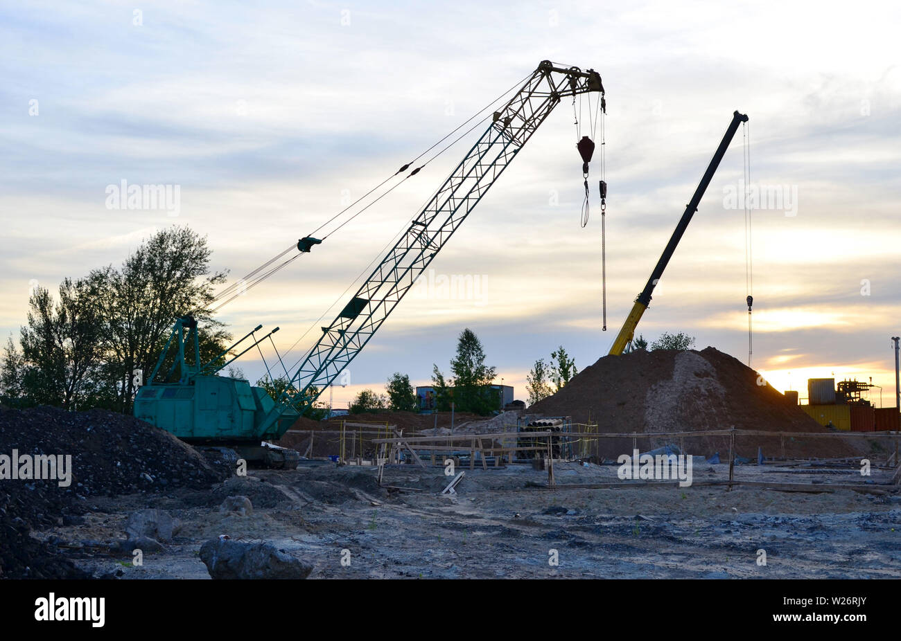 Crawler crane on the construction site for loading and unloading and ...