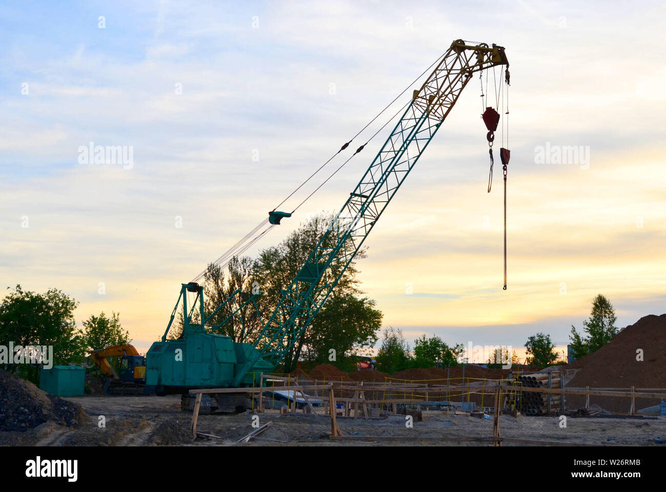 Crawler crane on the construction site for loading and unloading and ...