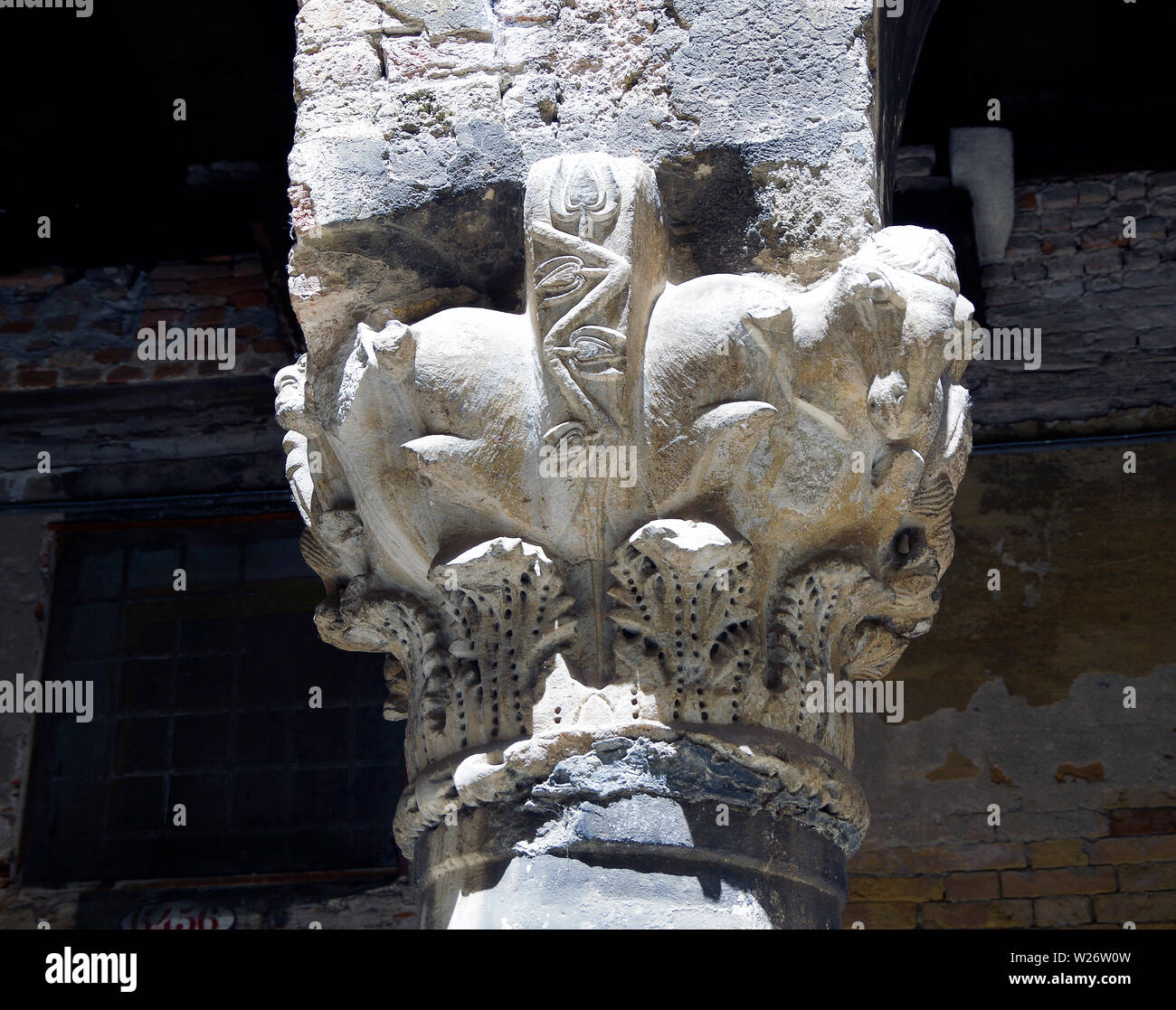 Two strange arches, of different sizes and shapes, one stilted, as if ...