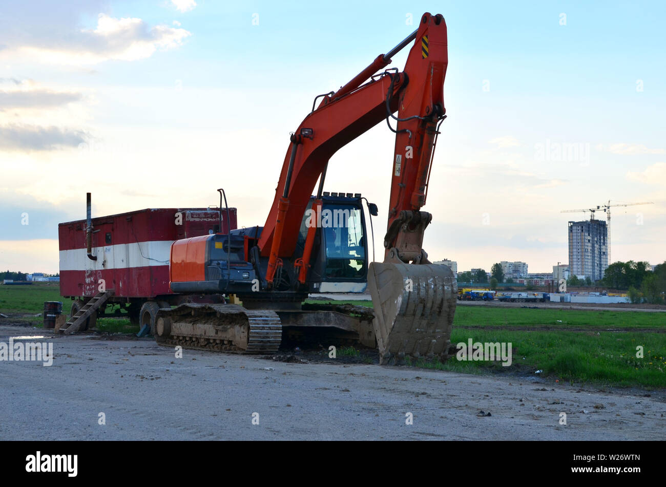 Crawler excavator in construction site on blue sky background. Special ...