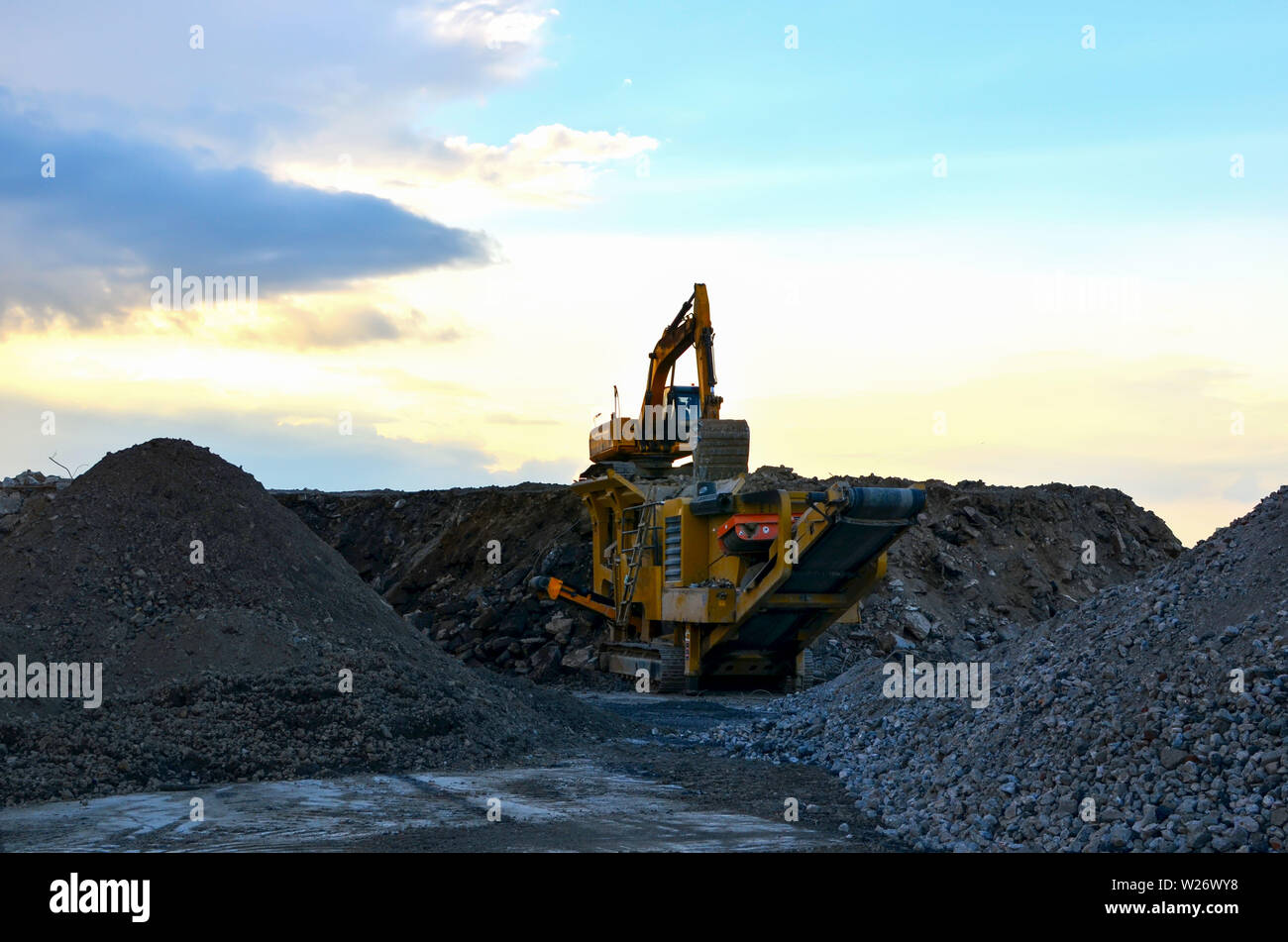 Mobile Stone crusher machine by the construction site or mining quarry ...