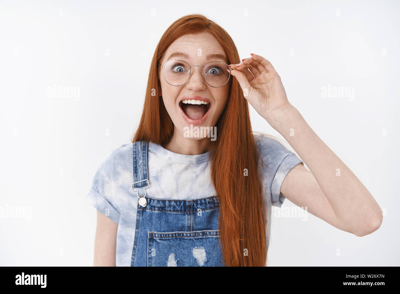 Lively Redhead Impressed Happy Girl Wear Denim Overalls Smiling Amazed