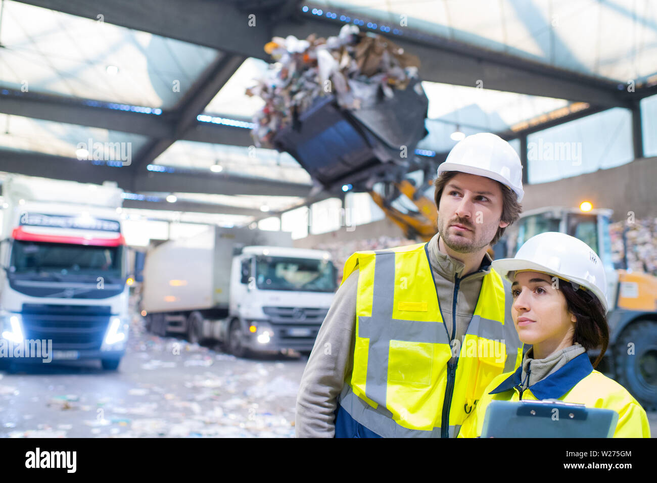 workers in a recycling plant Stock Photo - Alamy