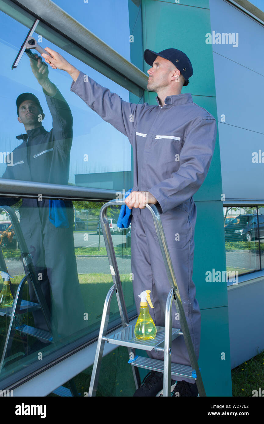 window washer working at building outdoor Stock Photo - Alamy